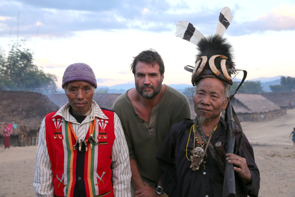 Henry Cookson with native Nagaland members in Myanmar ⋆ Globetrender